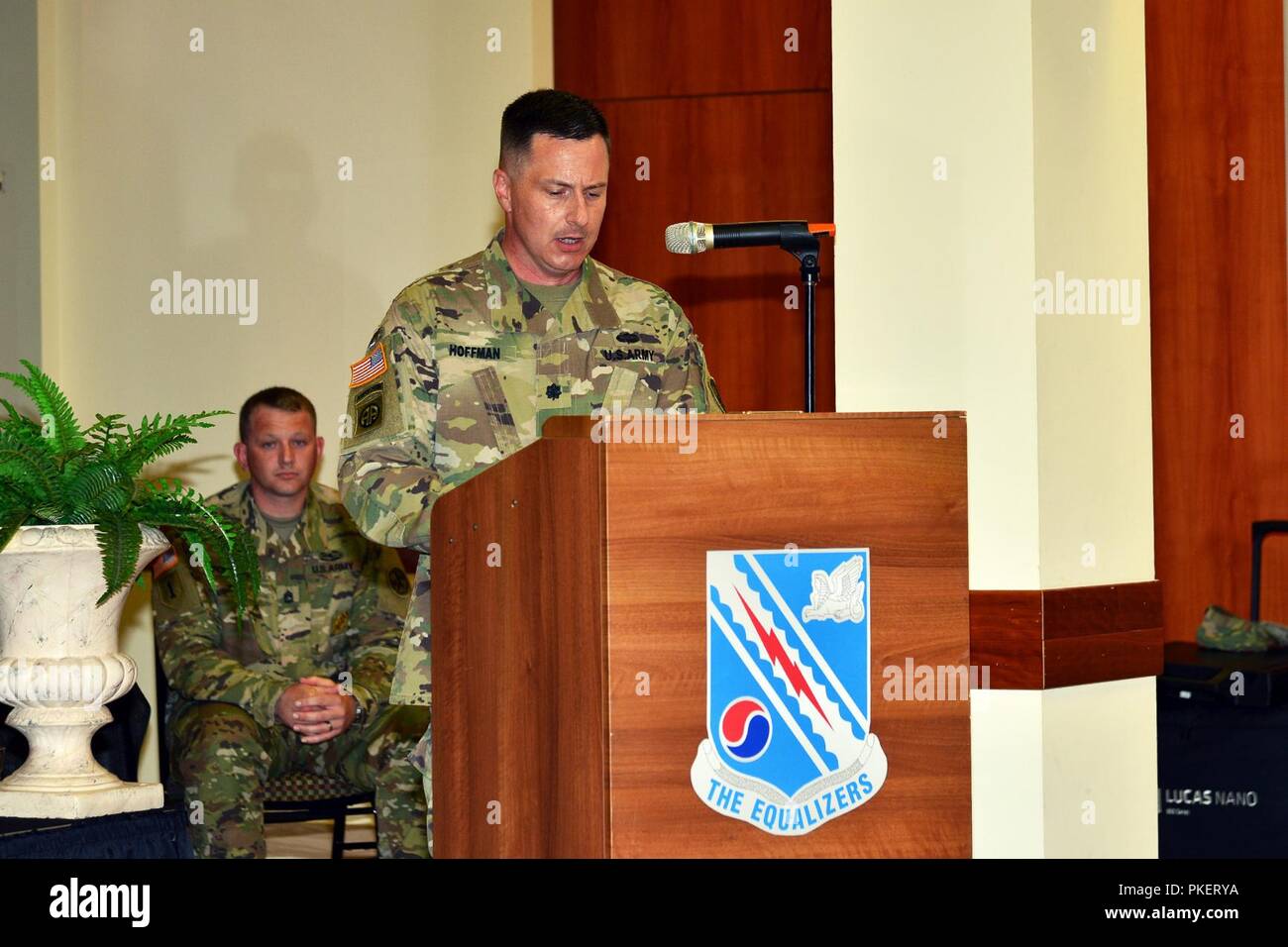 U.S. Army Lt. Col. Jared A. Hoffman, commander of 522nd Military Intelligence Battalion, gives a ...