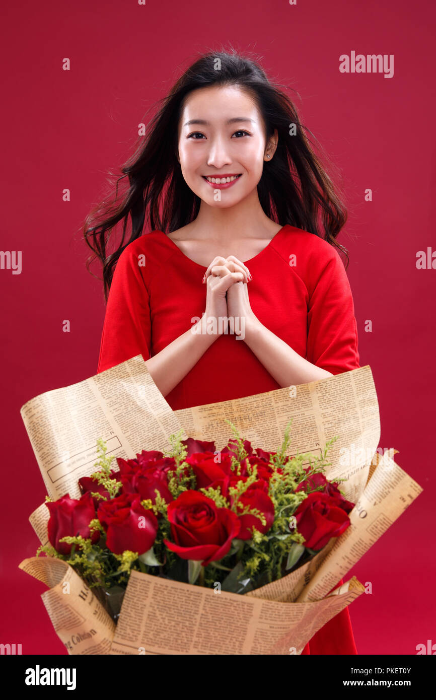 Young women received roses Stock Photo - Alamy