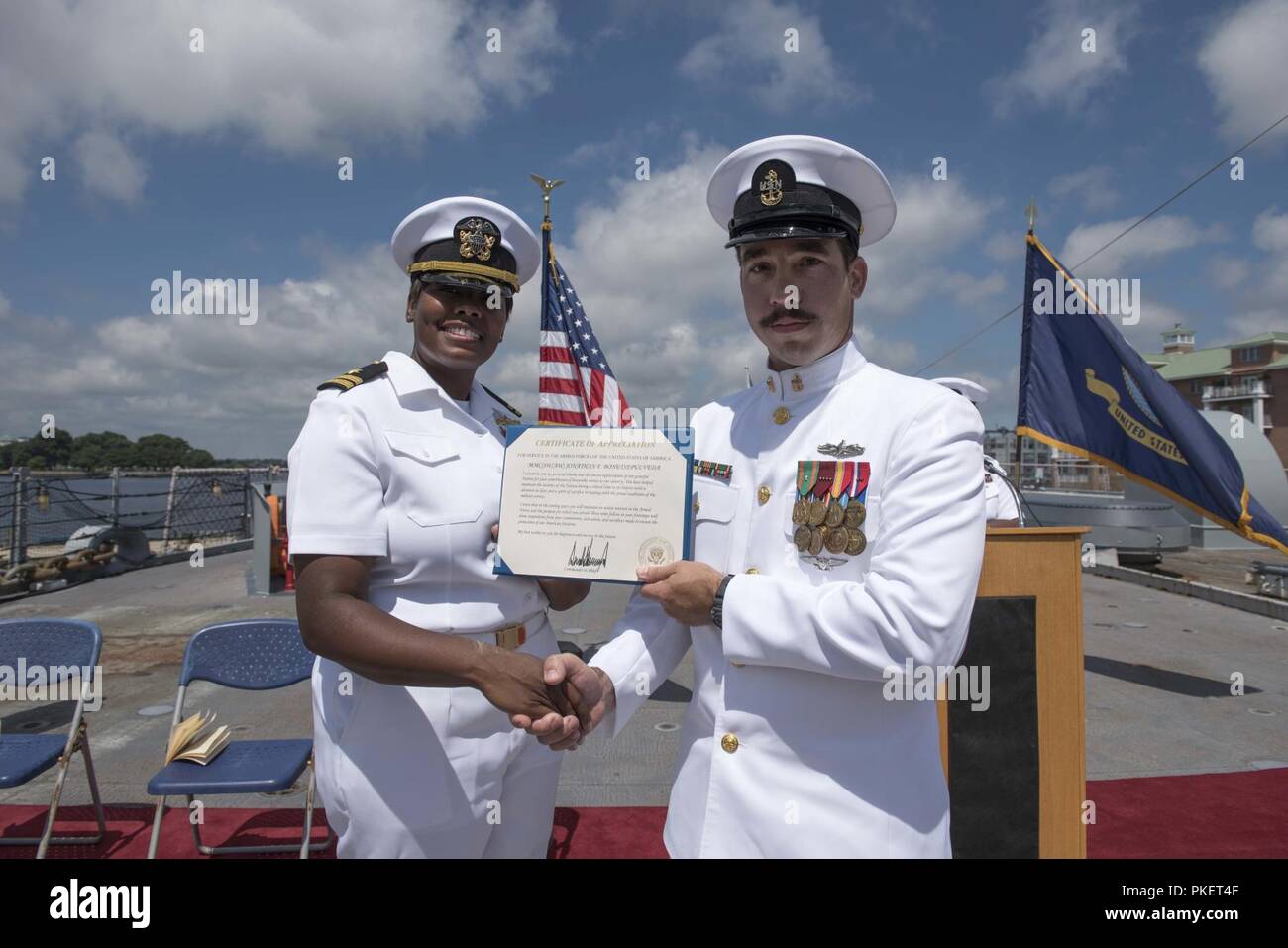 NORFOLK, Va. (July 26, 2018) Lt. Pamela Pettis, left, presents Chief ...