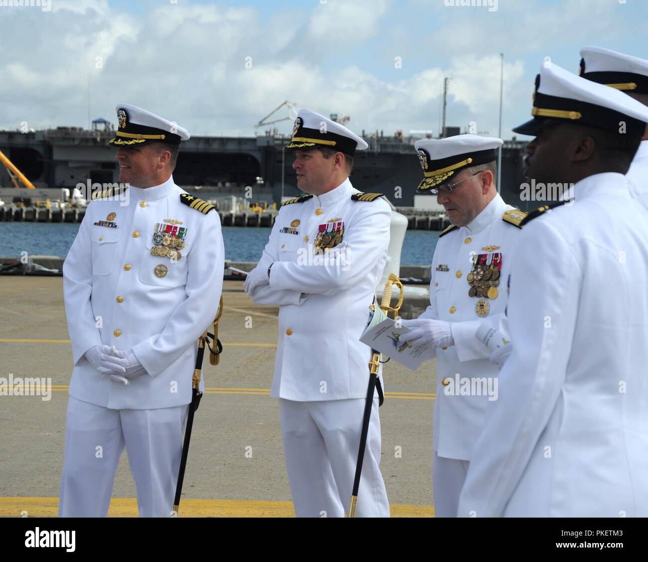 NORFOLK, Va. (Aug. 1, 2018) Capt. Martin Muckian (left) Capt. Carl ...