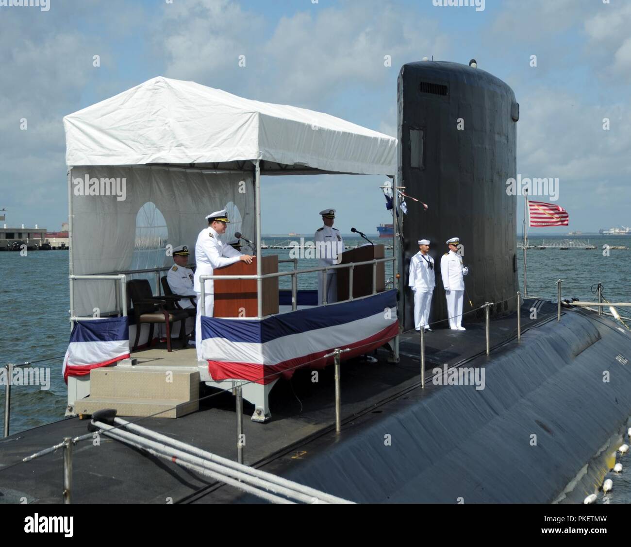 NORFOLK, Va. (Aug. 1, 2018) Capt. Carl Hartsfield, Commander Submarine Squadron Six, addresses ...