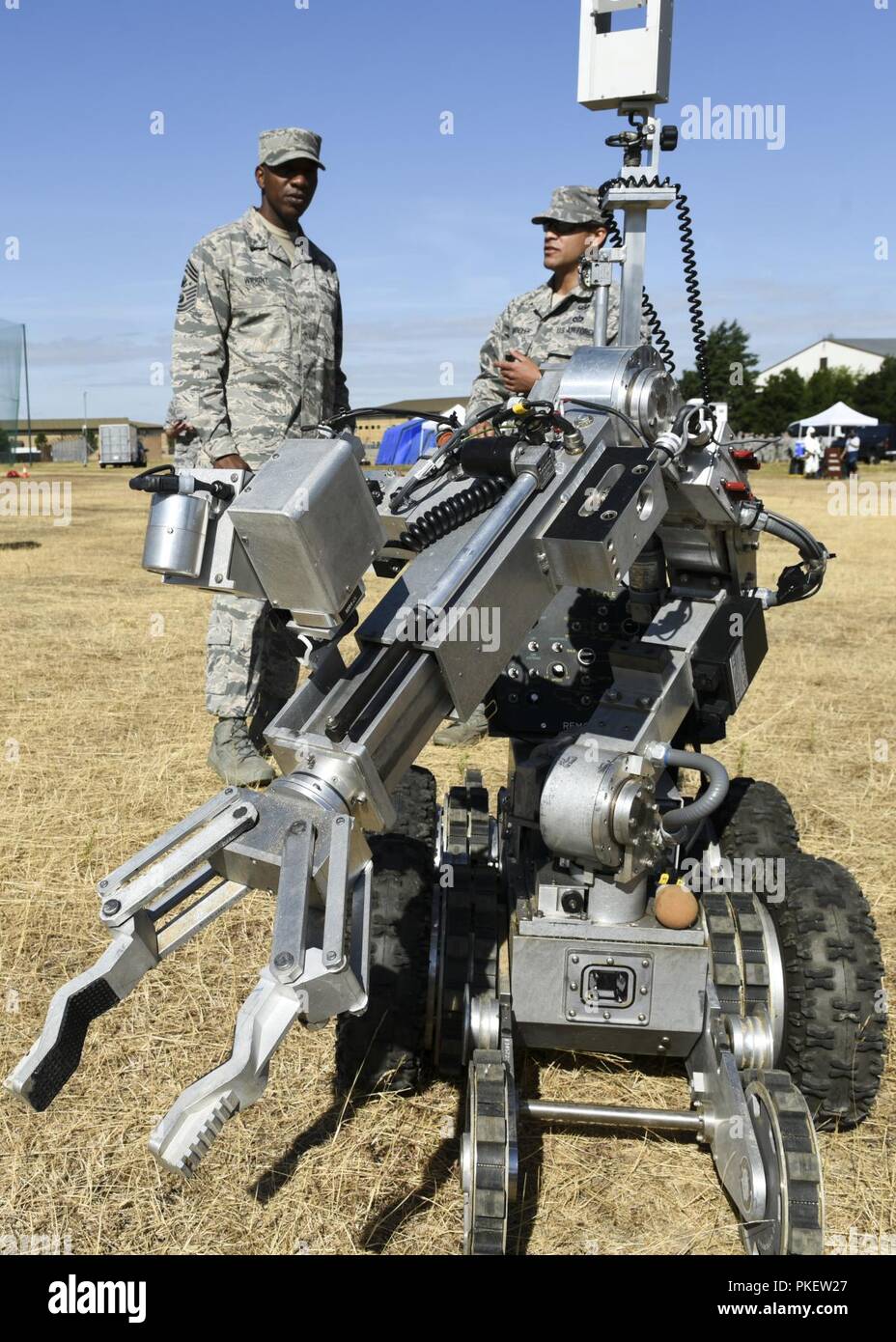 Chief Master Sgt. of the Air Force Kaleth O. Wright examines an ...