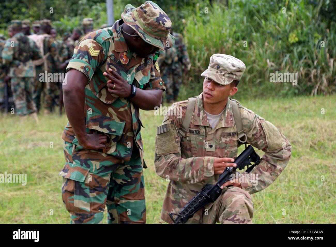 U.S. Army Soldiers receive training on jungle movements and signals at ...