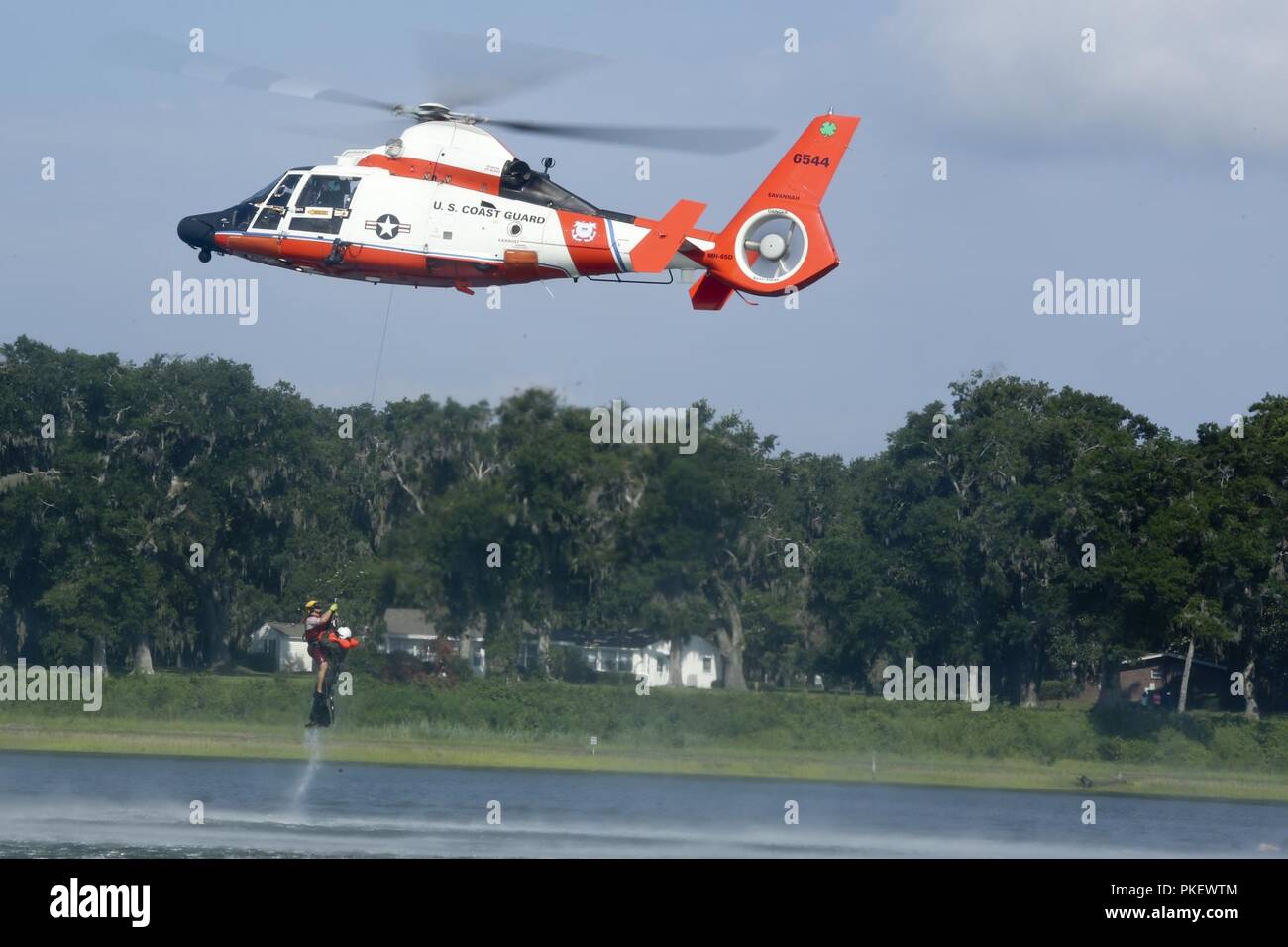 An MH-65 Dolphin helicopter assigned to Coast Guard Air Station ...