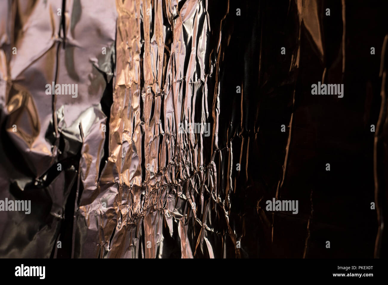 Close up of metal texture. Macro of crushed and wrinkled metallic tin ...