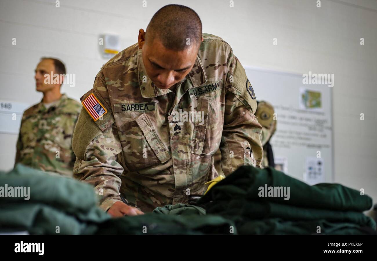 Sgt. Roel Sardea, a logistics specialist with the 176th Engineer ...