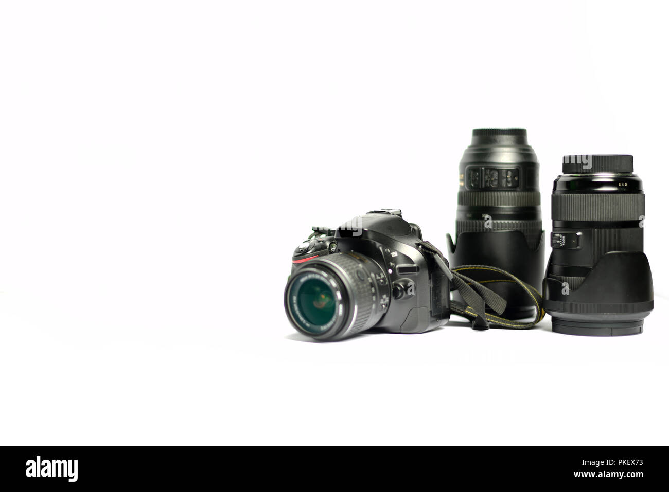 Digital SLR Camera and lens isolated on white background Stock Photo ...