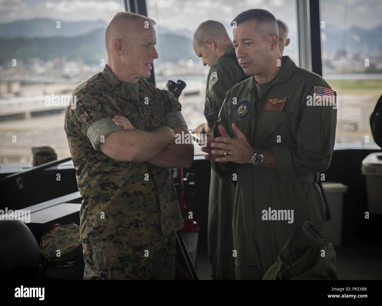Maj. Gen. Thomas Weidley (left) speaks with Sgt. Maj. Anthony Spadaro ...