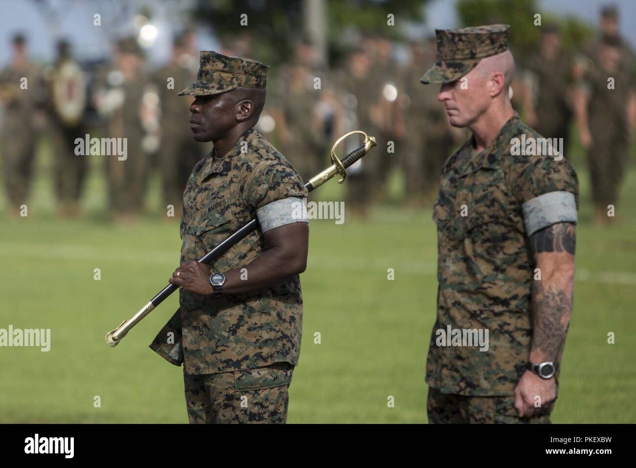 Sgt. Maj. James E. Monroe, left, stands with the noncommissioned ...