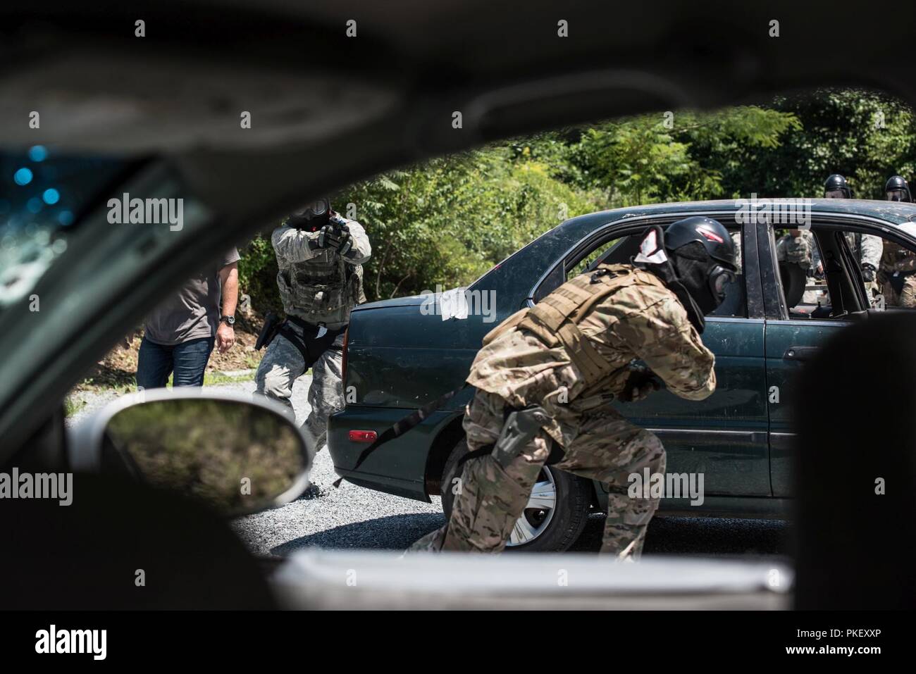 Two security forces specialists from the 193rd Special Operations ...