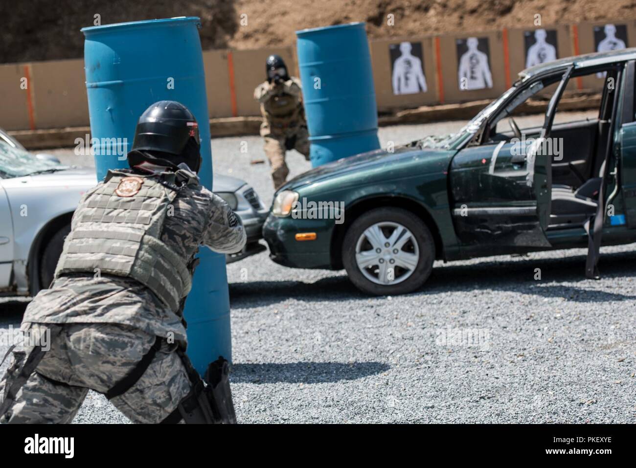 Two security forces specialists from the 193rd Special Operations ...
