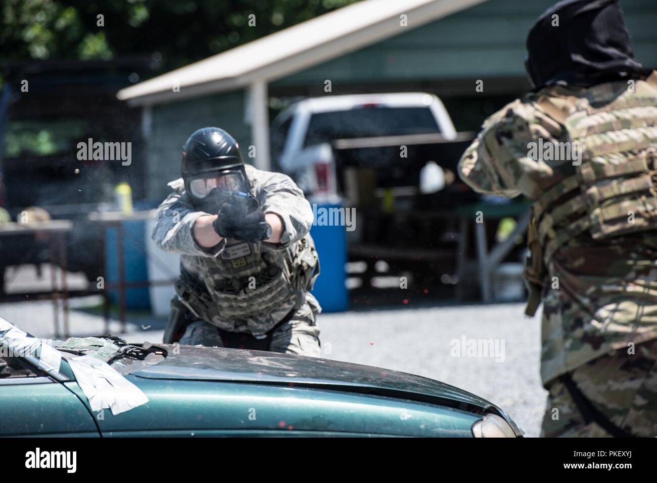 Two security forces specialists from the 193rd Special Operations ...