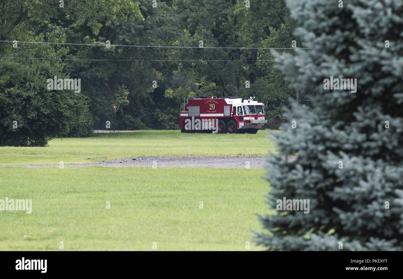 Members of the 788th Civil Engineer Fire Department respond to a ...