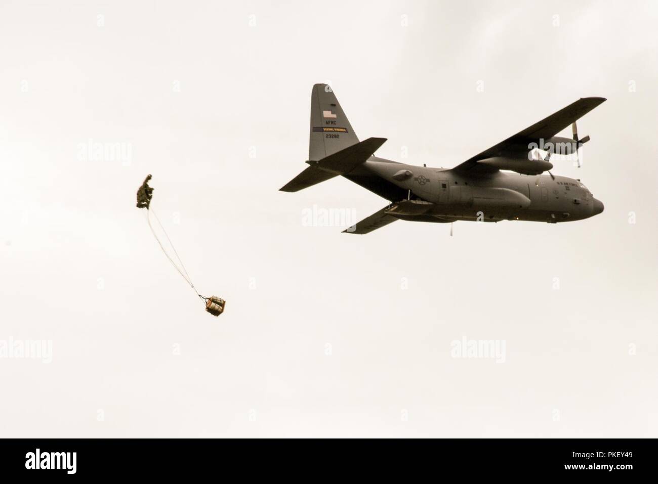 A 934th Airlift Wing C-130 released airdrop pallets during training at ...