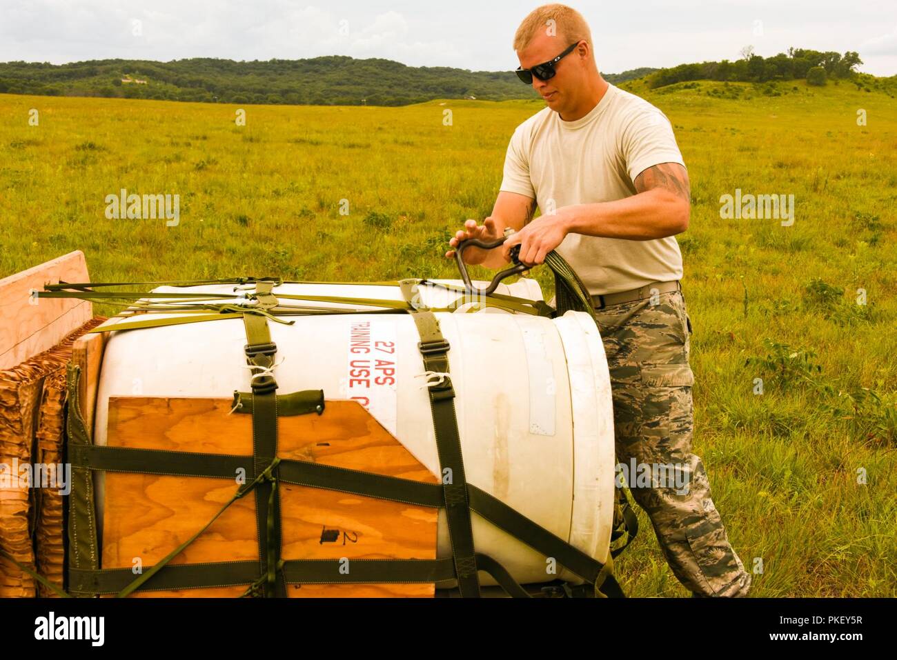 A 934th Airlift Wing C-130 released airdrop pallets during training at ...