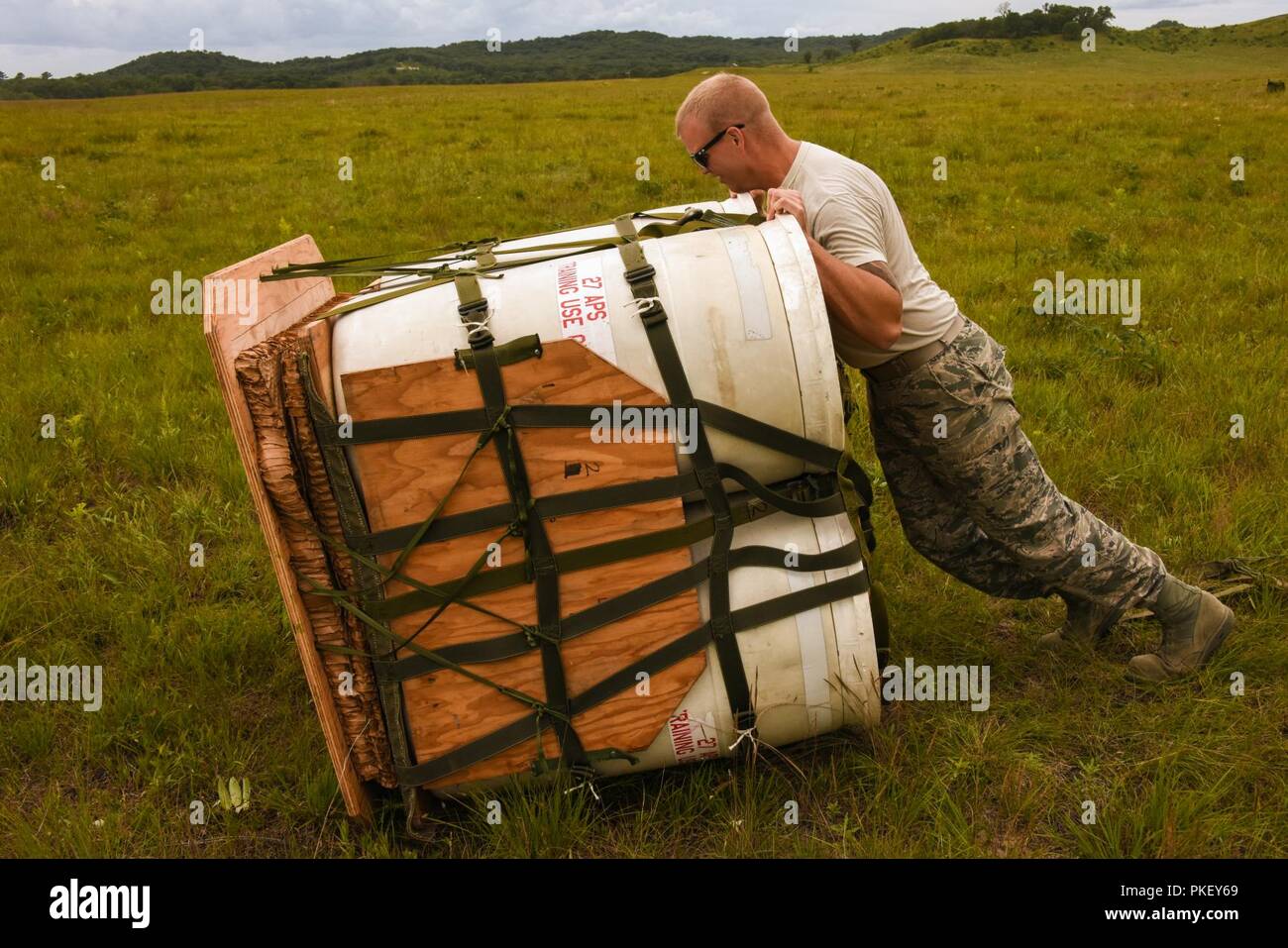 A 934th Airlift Wing C-130 released airdrop pallets during training at ...