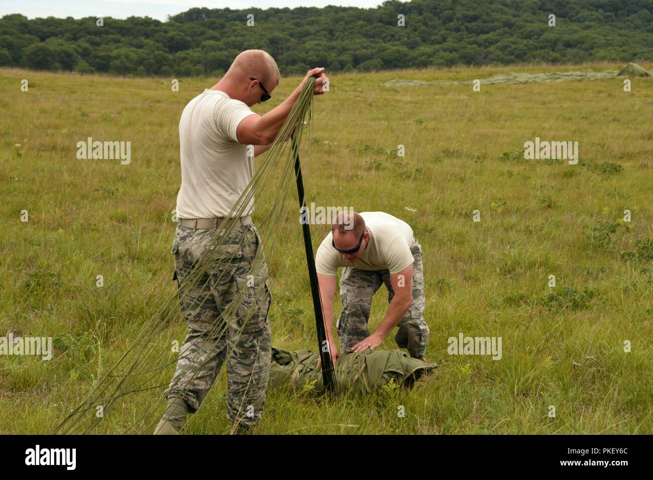 A 934th Airlift Wing C-130 released airdrop pallets during training at ...