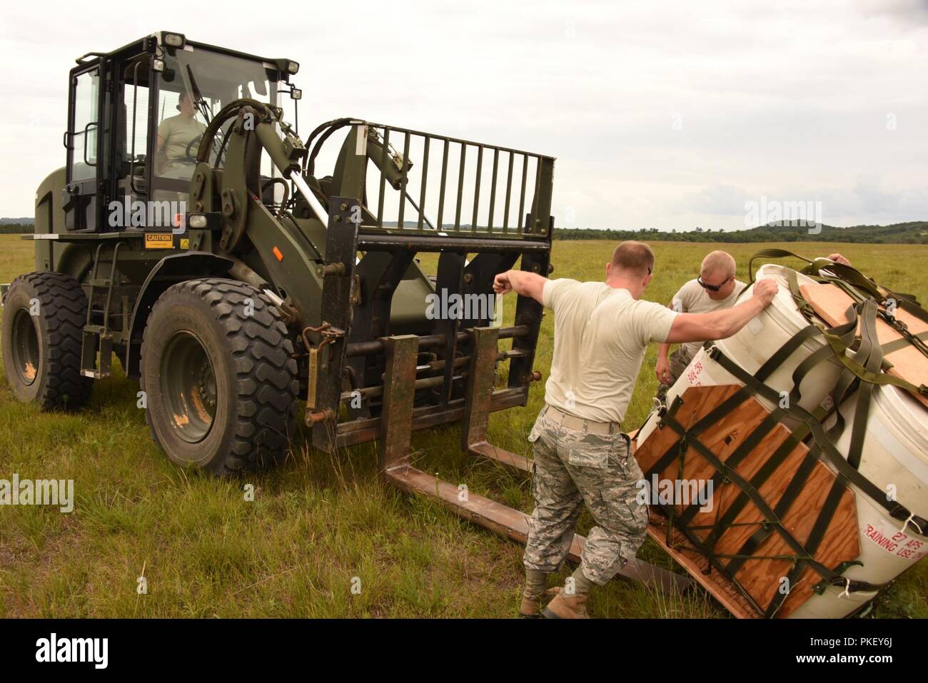 A 934th Airlift Wing C-130 released airdrop pallets during training at ...