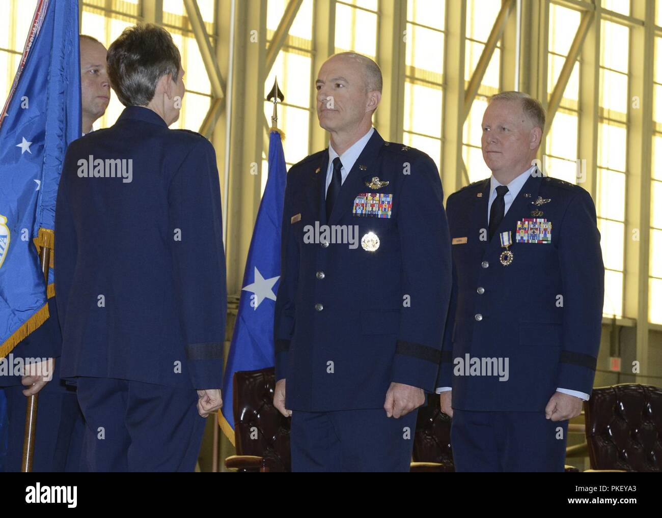 Brig. Gen. Christopher P. Azzano (center), accepts command of the Air ...