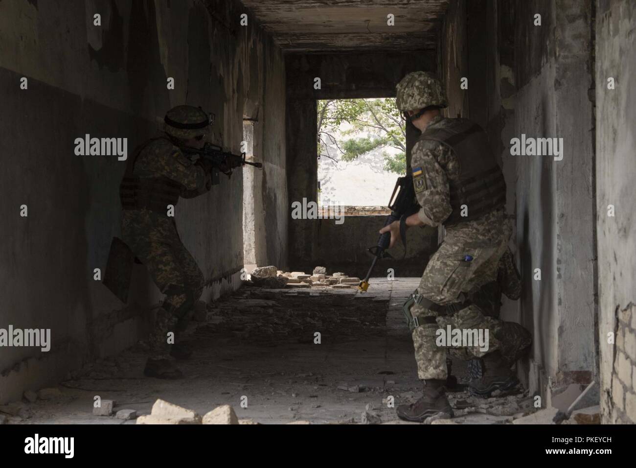 Ukrainian Marines work their way through an objective during urban ...