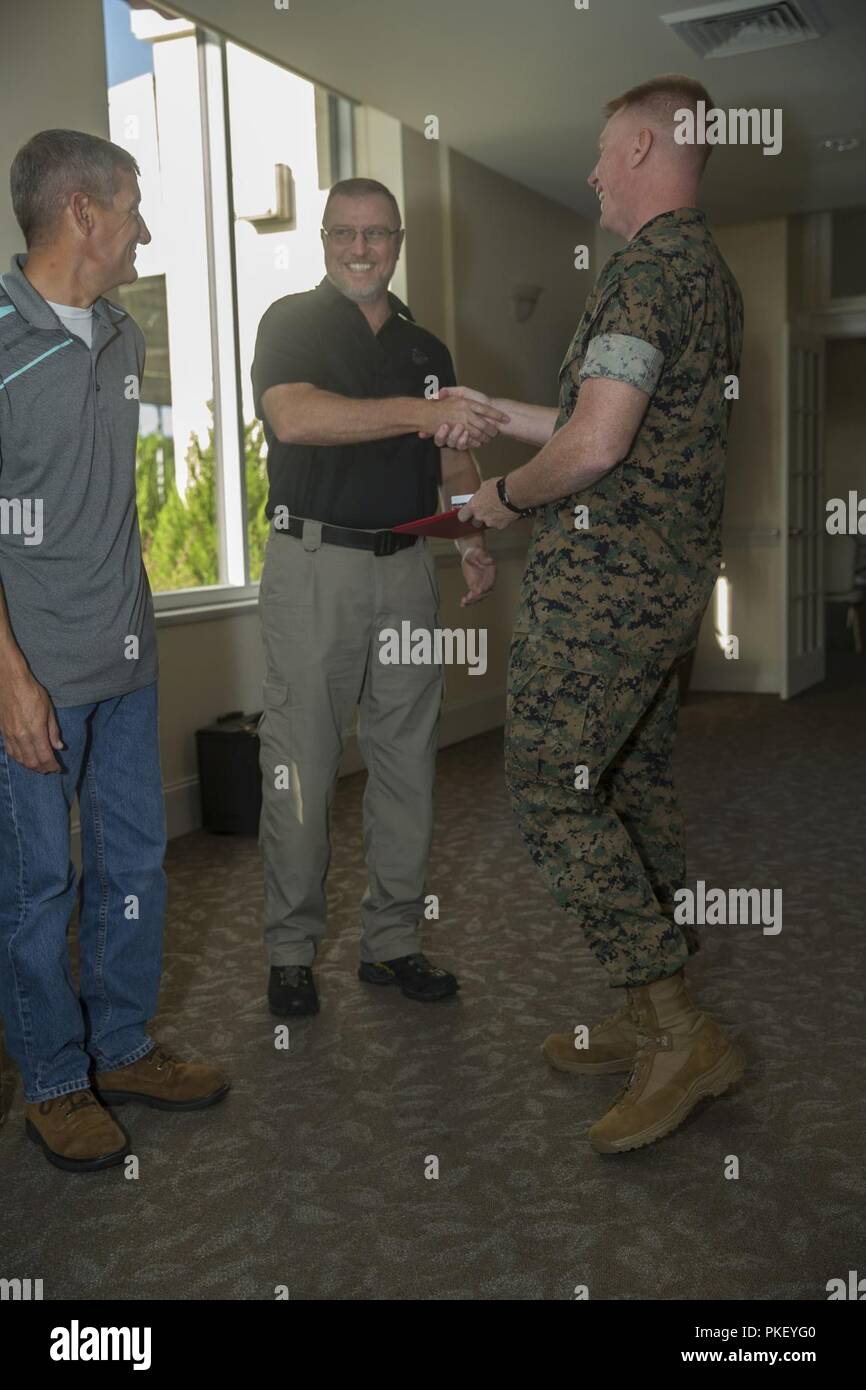 Toby T. Covarrubias receives the Length of Service award at the ...