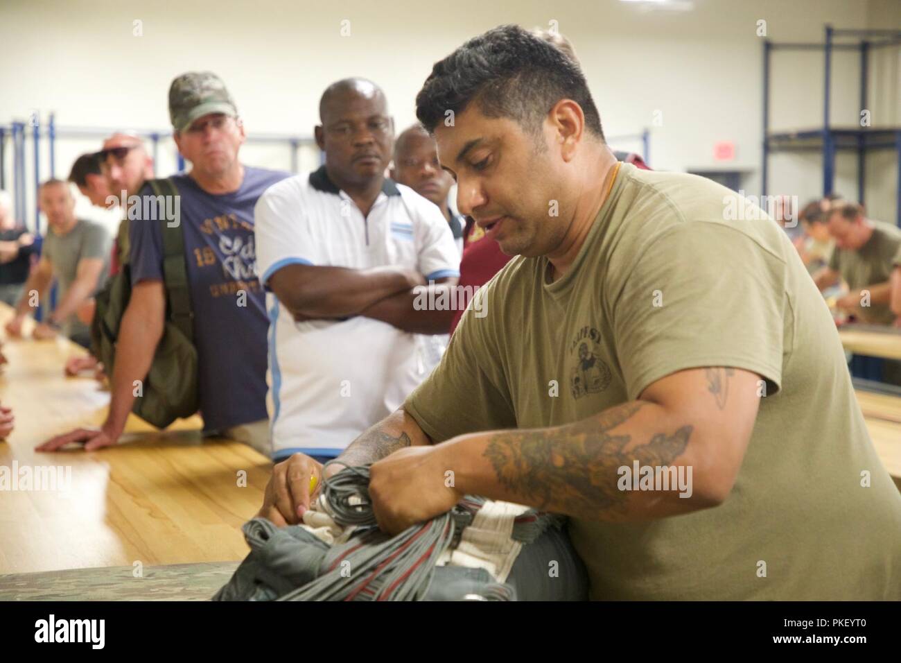 U.S. Army Sgt. Roger Montanez, assigned to Rigger Detachment, 56th ...
