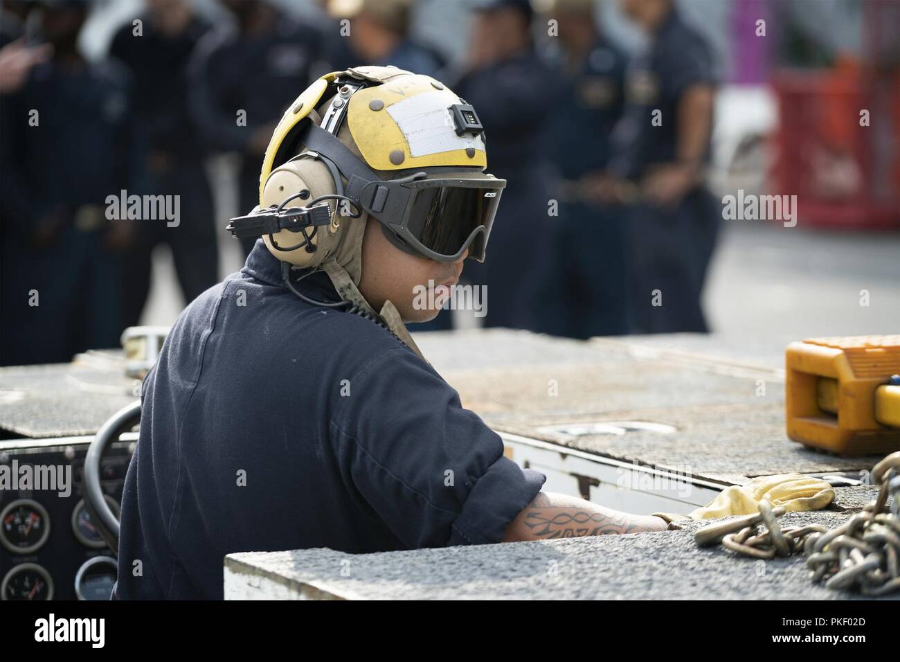 Us navy flight deck tractor hi-res stock photography and images - Alamy