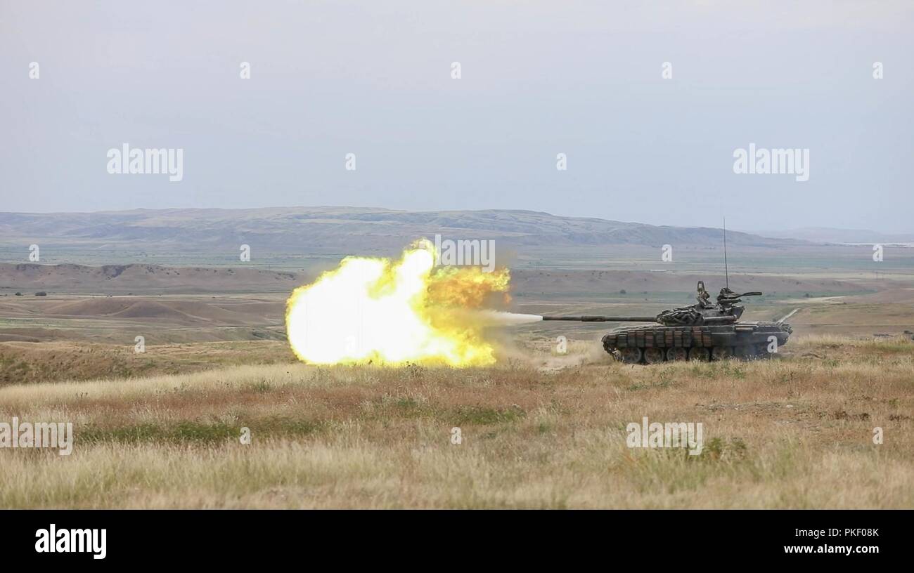 A Georgian Armed Forces T-72 tank engages targets down range as part of ...