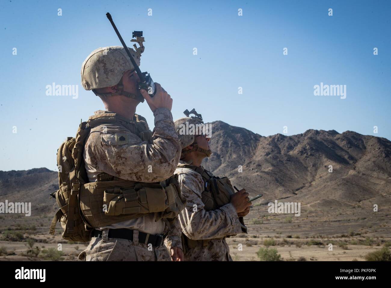 U.S. Marine Corps Sgt. Kaleb Coy, and Cpl. Xavier Tapia, fire support ...