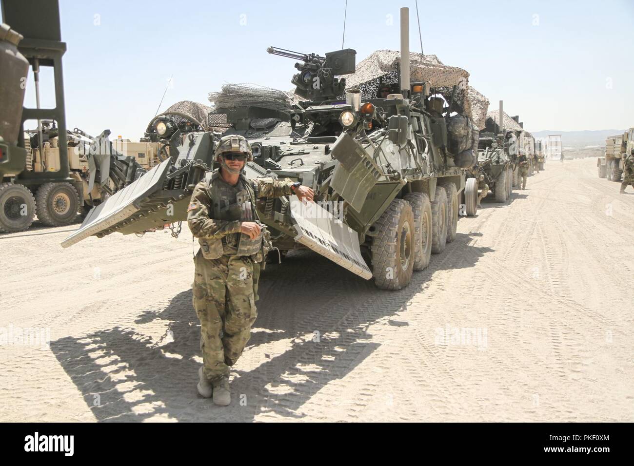Spc. Nick Simpson of Alpha Company, 103rd Brigade Engineer Battalion ...