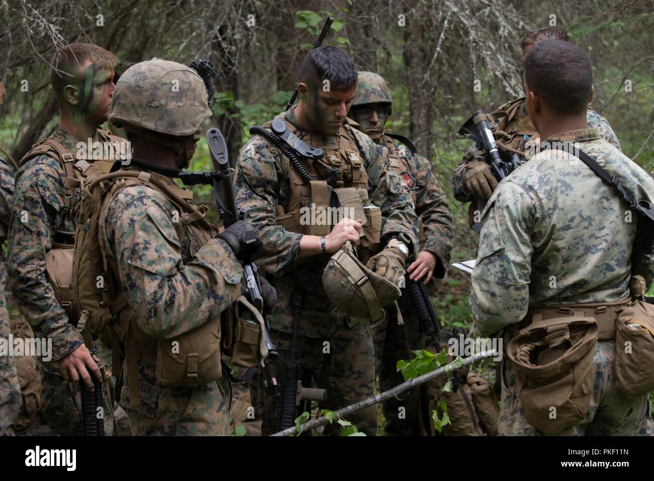 Marines with 3rd Battalion, 23rd Marine Regiment, competing in the 4th Marine Division Annual ...