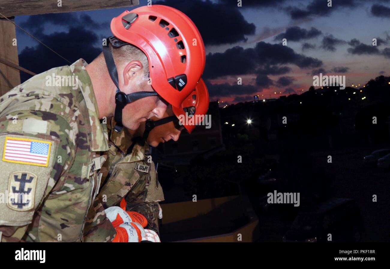 Sgt. 1st Class Robby E. Creech and Sgt. Andrew Ware, with the Florida ...