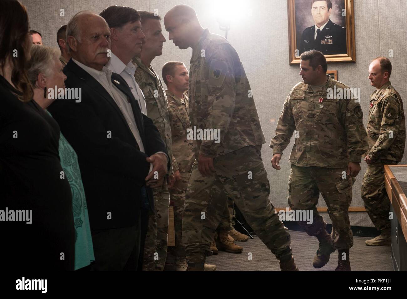 Attendees stand as Major General Michael Thompson, Adjutant General for ...
