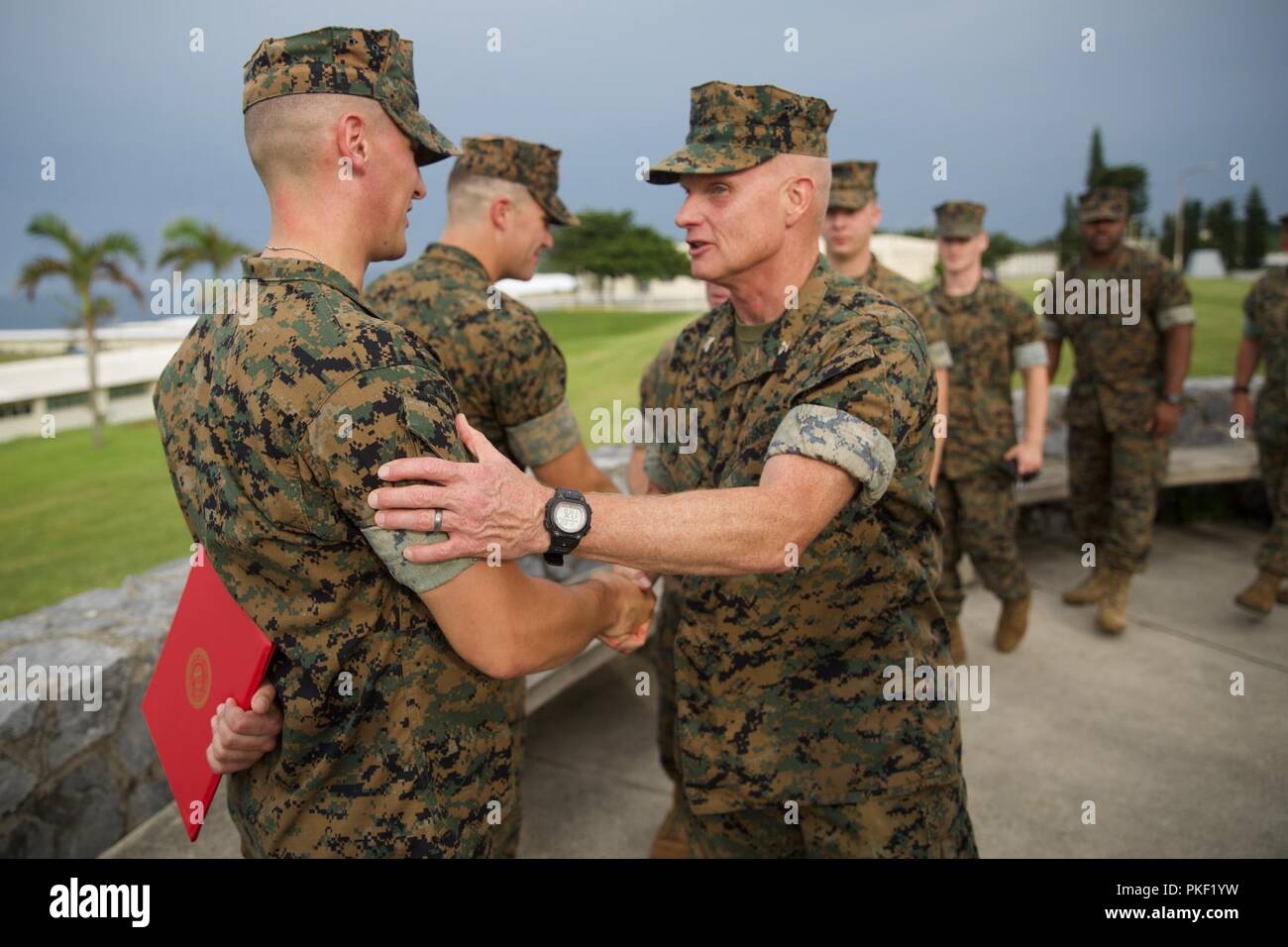 Sgt. Alexander J. Kraska and Sgt. Andrew M. Rief are congratulated by ...