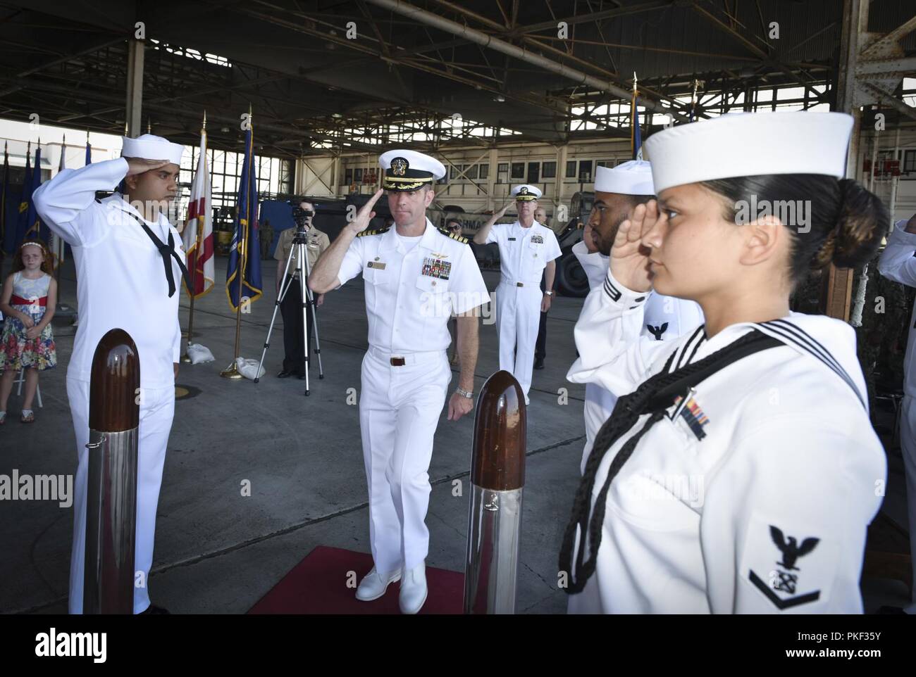 Honored guests arrive for the official change of command ceremony ...