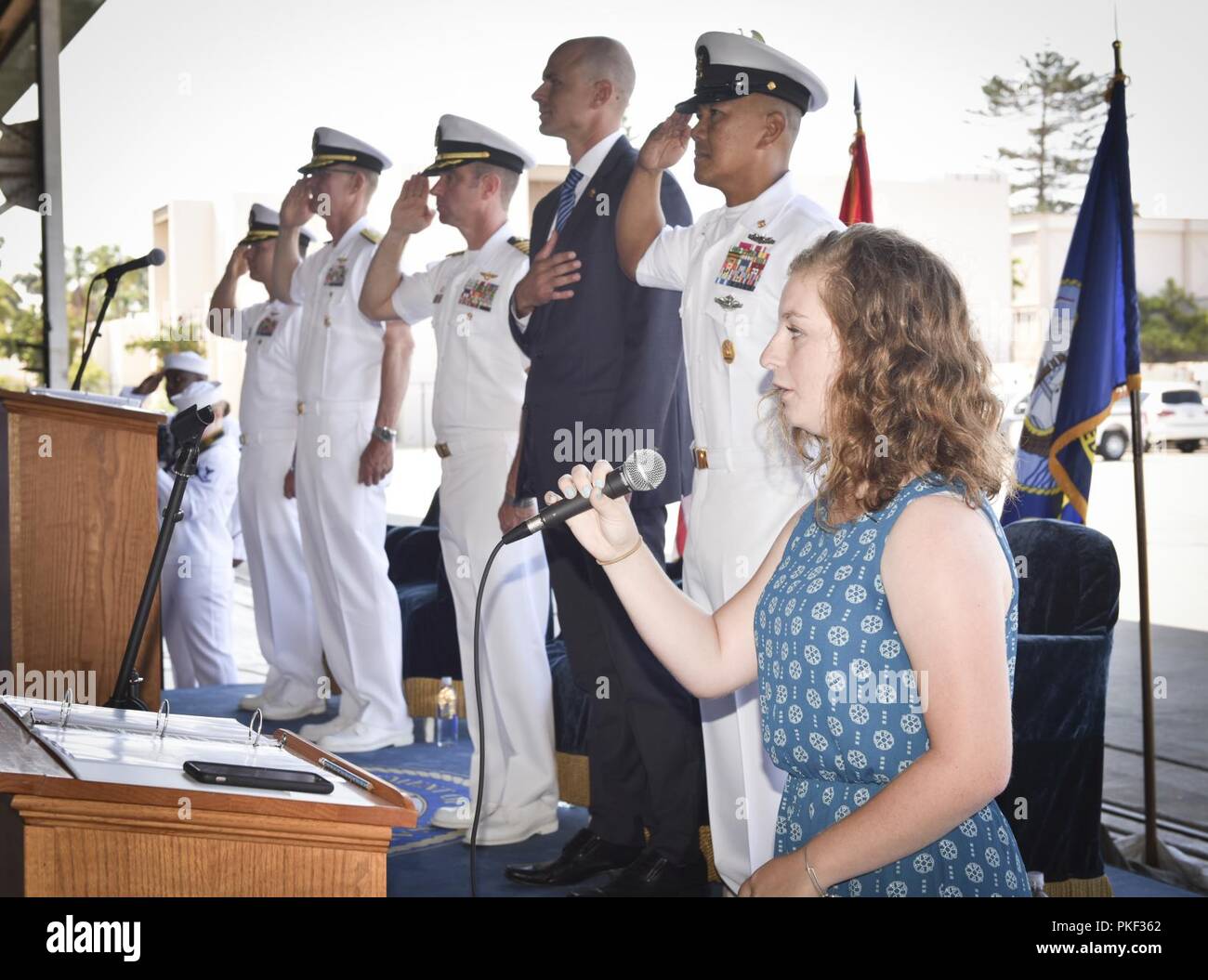 Gabriella Slentz sings the National Anthem during the official change ...