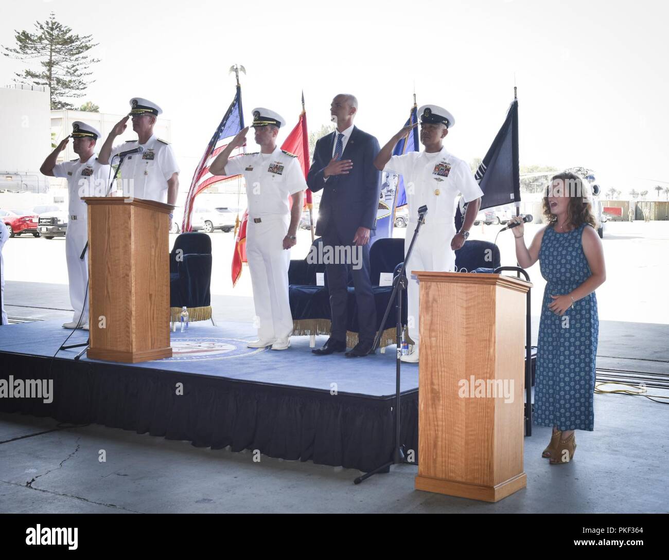 Gabriella Slentz sings the National Anthem during the official change ...