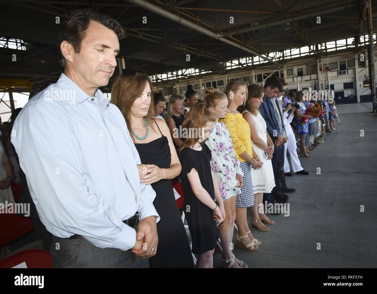 Gabriella Slentz signs the National Anthem during the official change ...