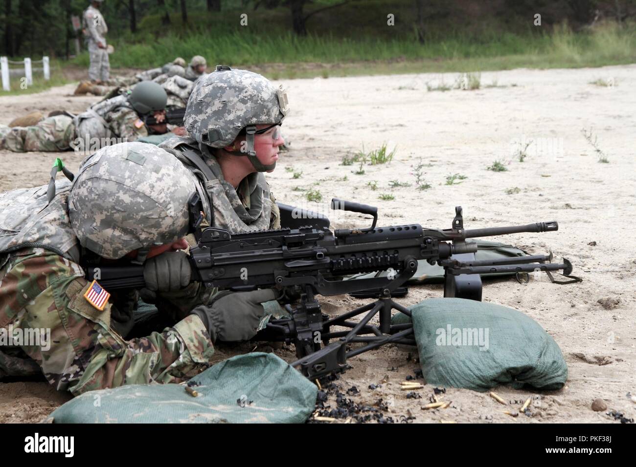 Sgt. 1st Class Edward Hystad, gunner, and Sgt. Kelsey Ebert, assistant ...