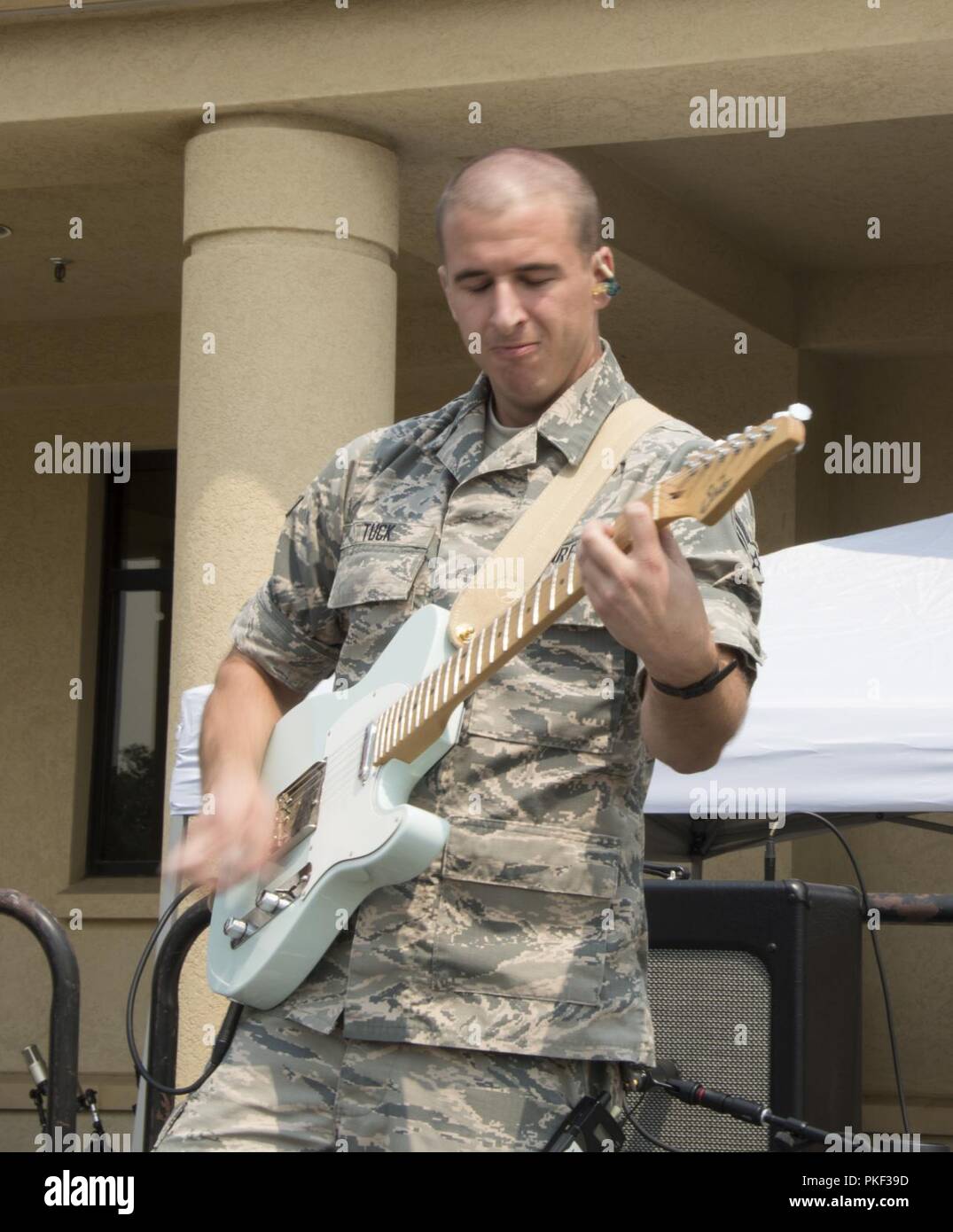 U.S. Air Force Airman 1st Class Michael Tuck entertains the attendees ...