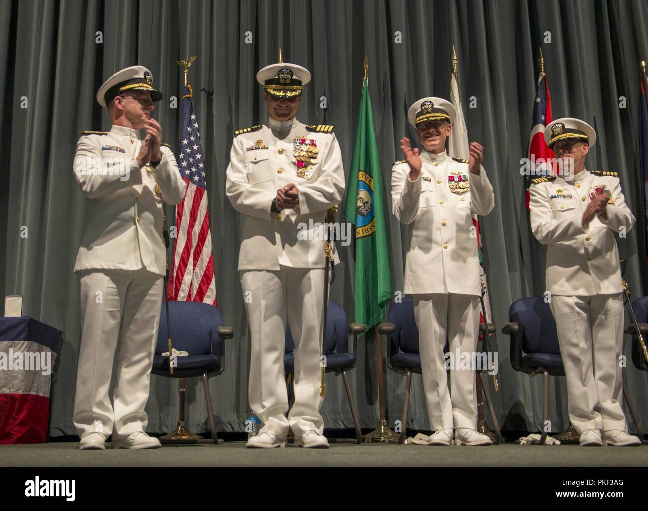 KEYPORT, Wash. (Aug. 06, 2018) Capt. Gerald Miranda, center, from San Diego, California ...