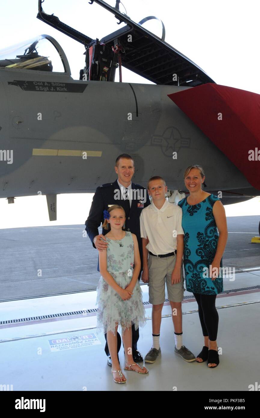 Oregon Air National Guard Col. Adam Sitler pause for a photograph with ...