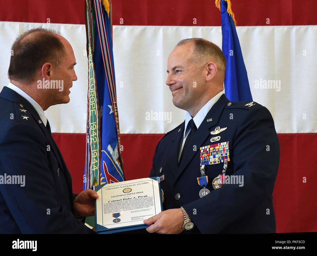 Maj. Gen. Michael Stencel, Adjutant General, Oregon, presents an award ...