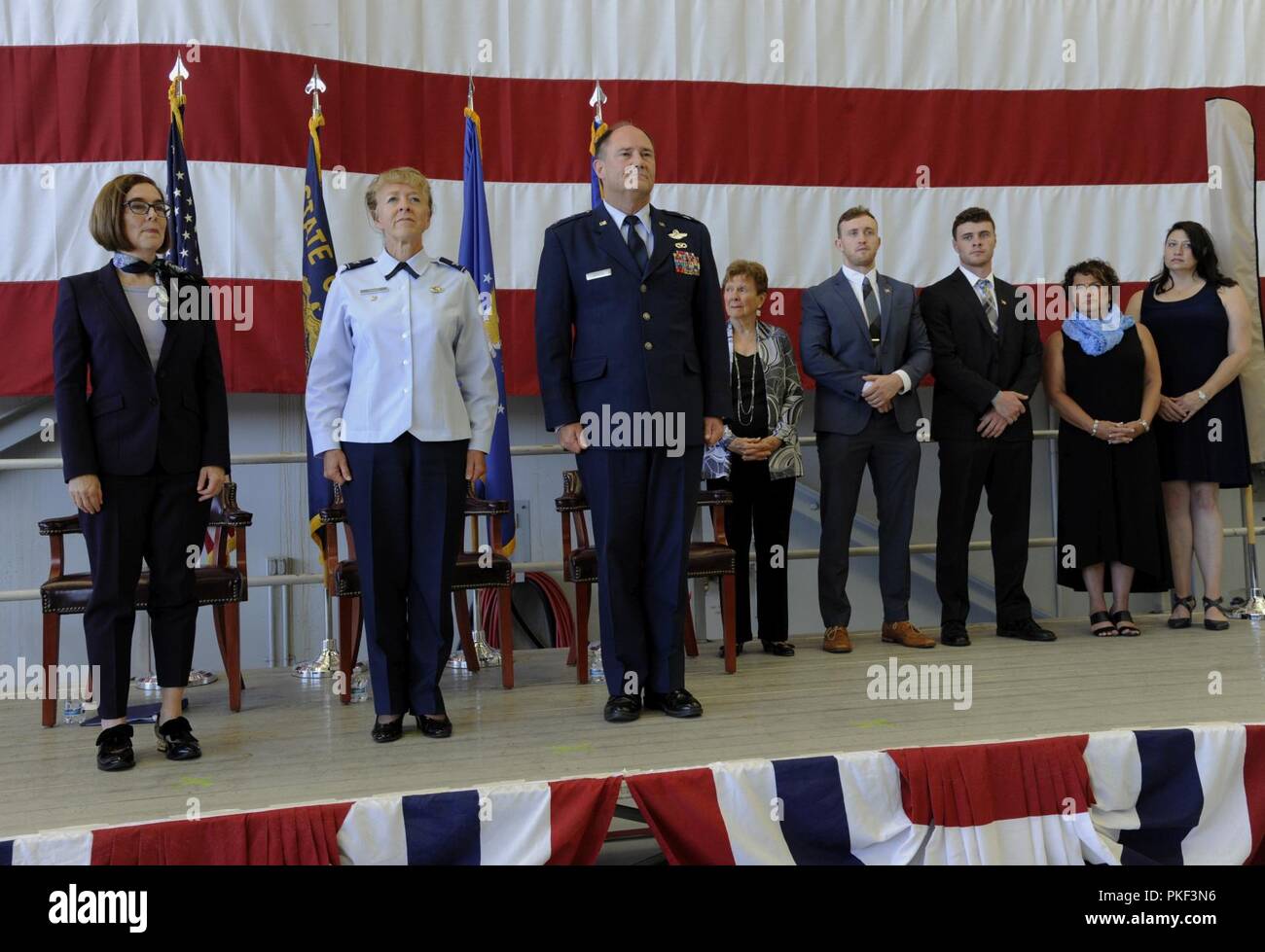 Oregon Air National Guard Col. Donna Prigmore (center) stands at ...