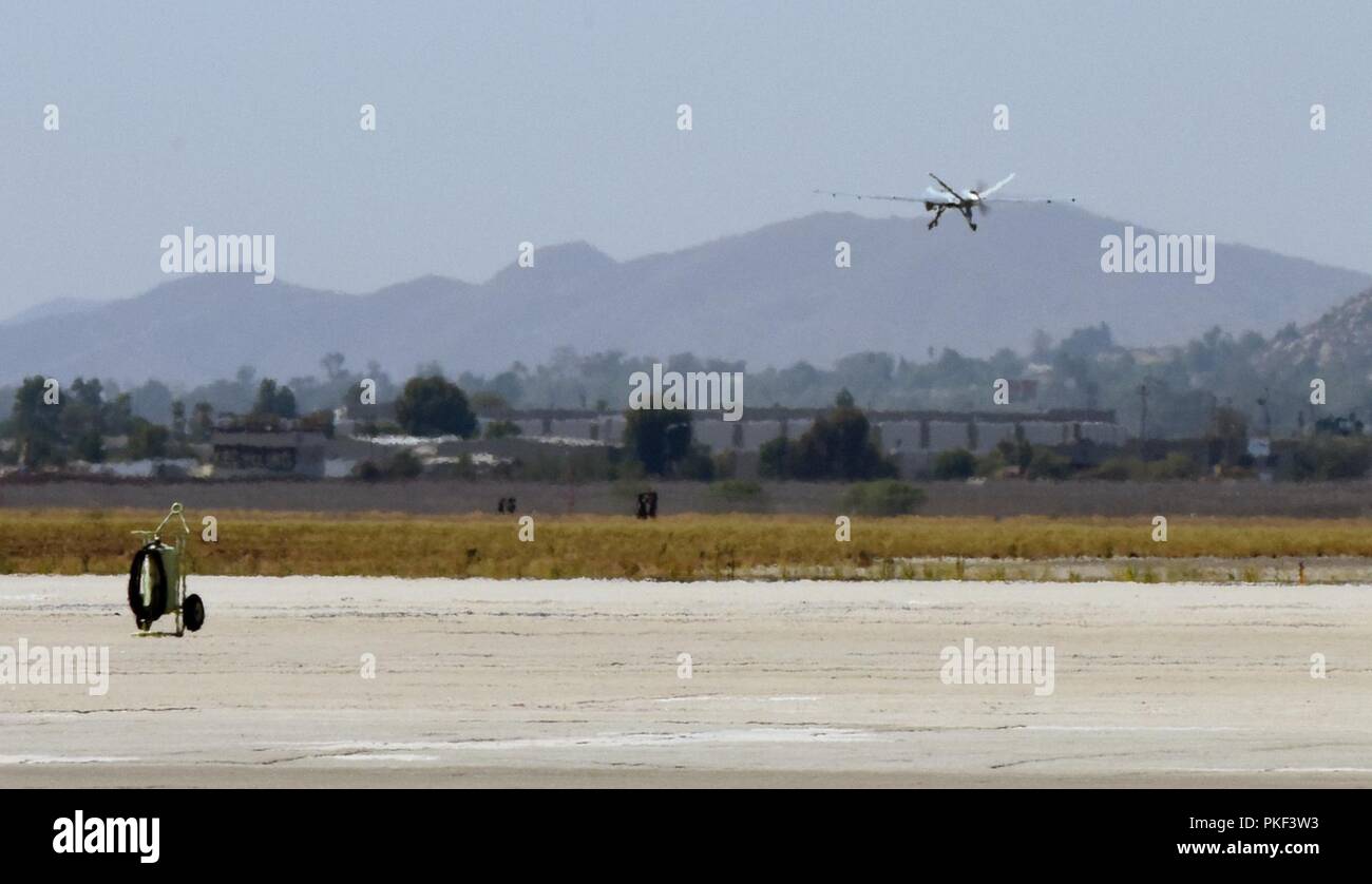 An MQ-9 Reaper remotely piloted aircraft from the 163d Attack Wing ...