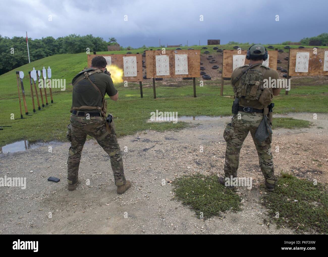 Sailors and Marines attached to Explosive Ordnance Disposal Mobile Unit ...