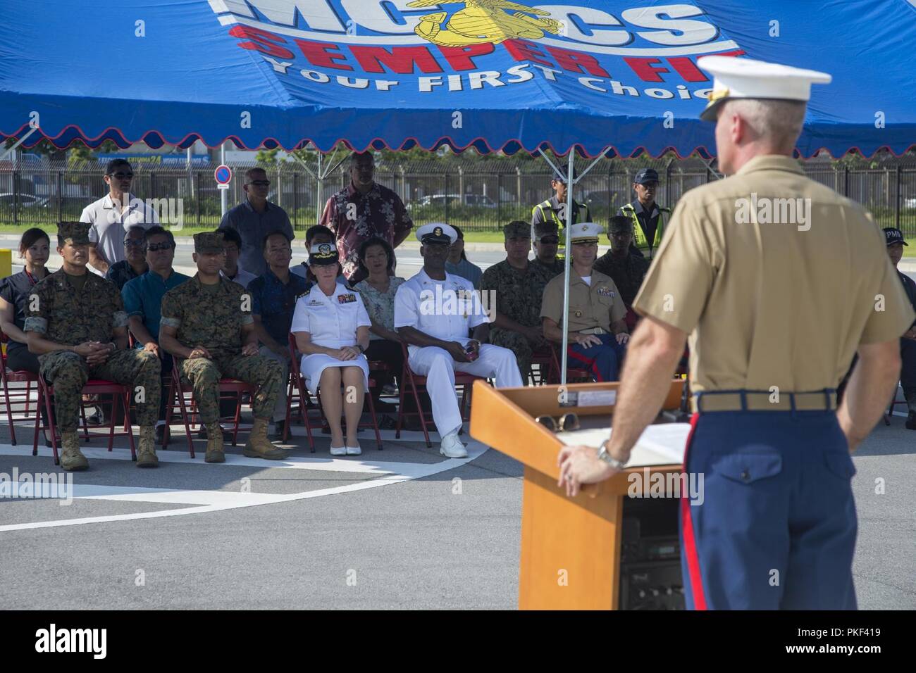 CAMP FOSTER, OKINAWA, Japan- Navy Capt. Cynthia Kuehner and Navy Master ...