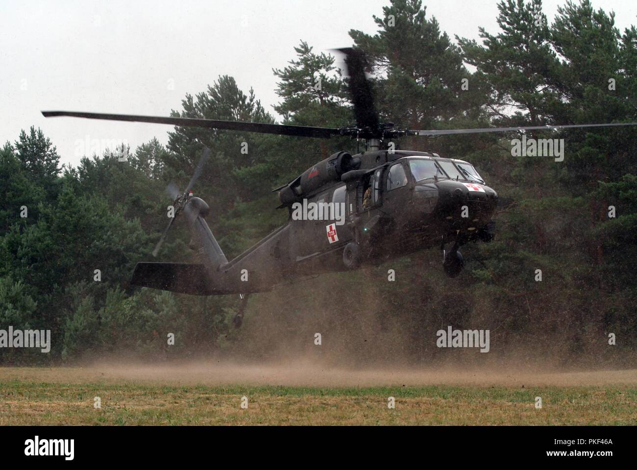An HH-60M MEDEVAC Black Hawk Helicopter begins landing as part of ...