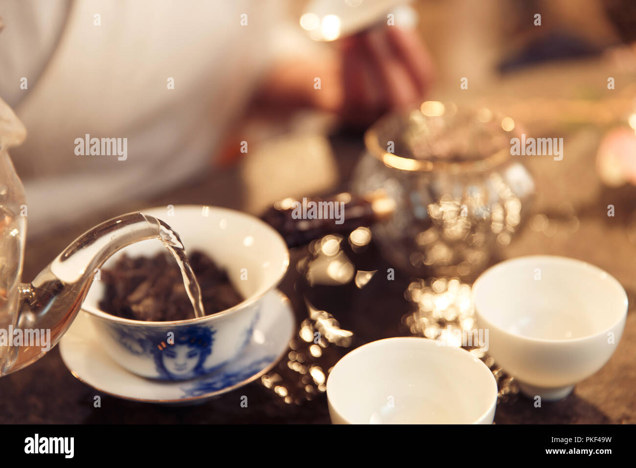 Young women make tea Stock Photo - Alamy