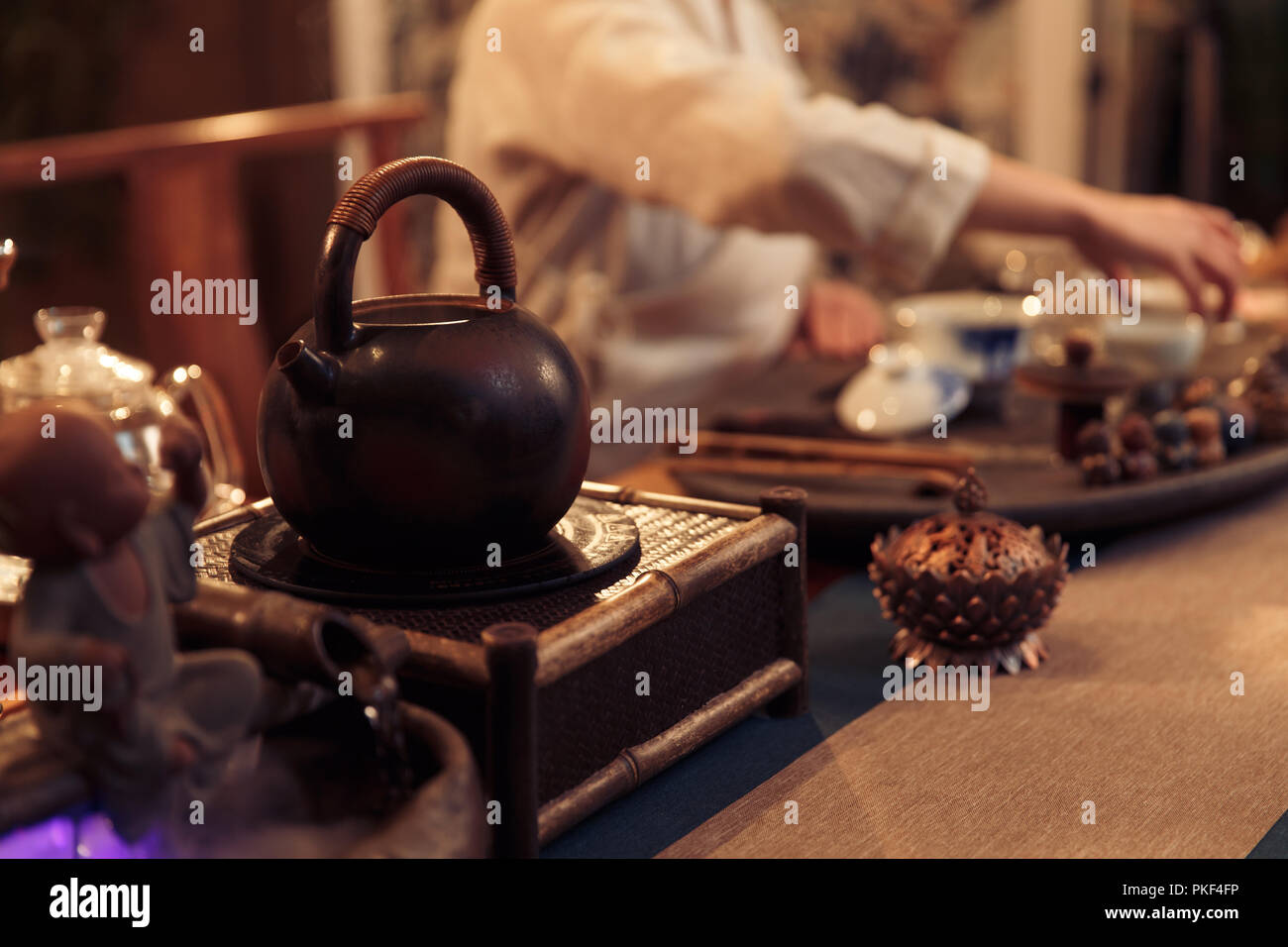 Young women make tea Stock Photo - Alamy